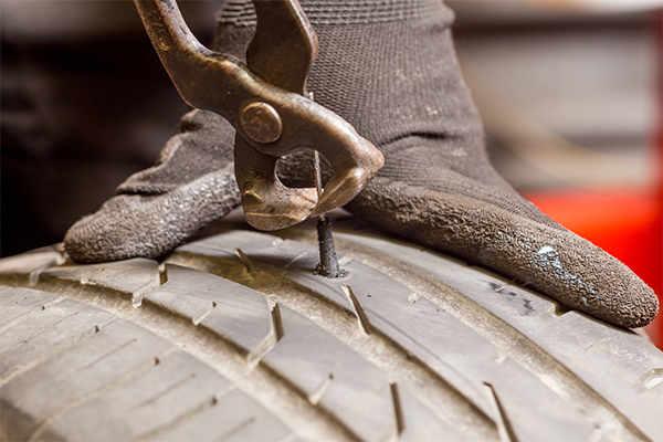 Que faire en cas de pneu crevé